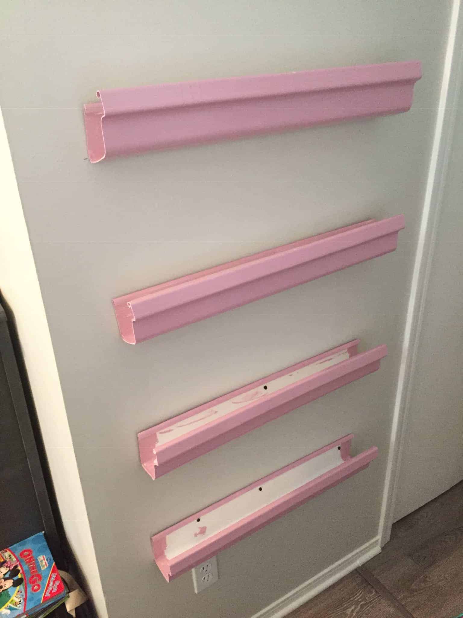 Five DIY Rain Gutter Bookshelves Under $10