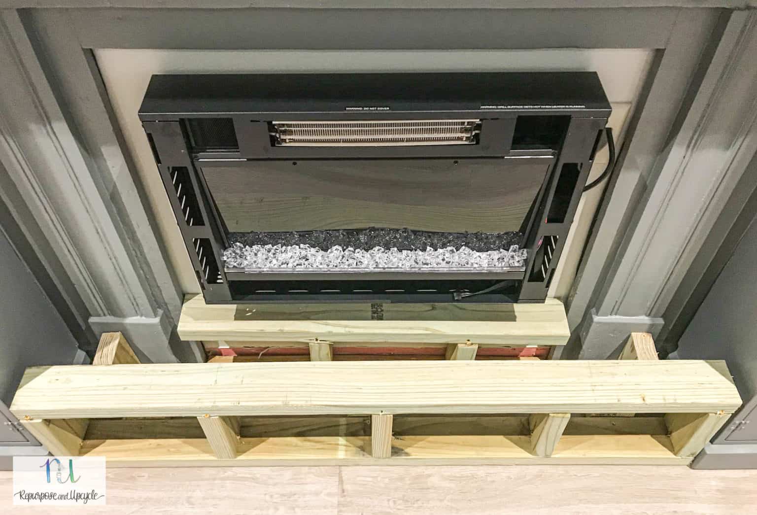 Our New DIY Raised Electric Fireplace Hearth with Stone