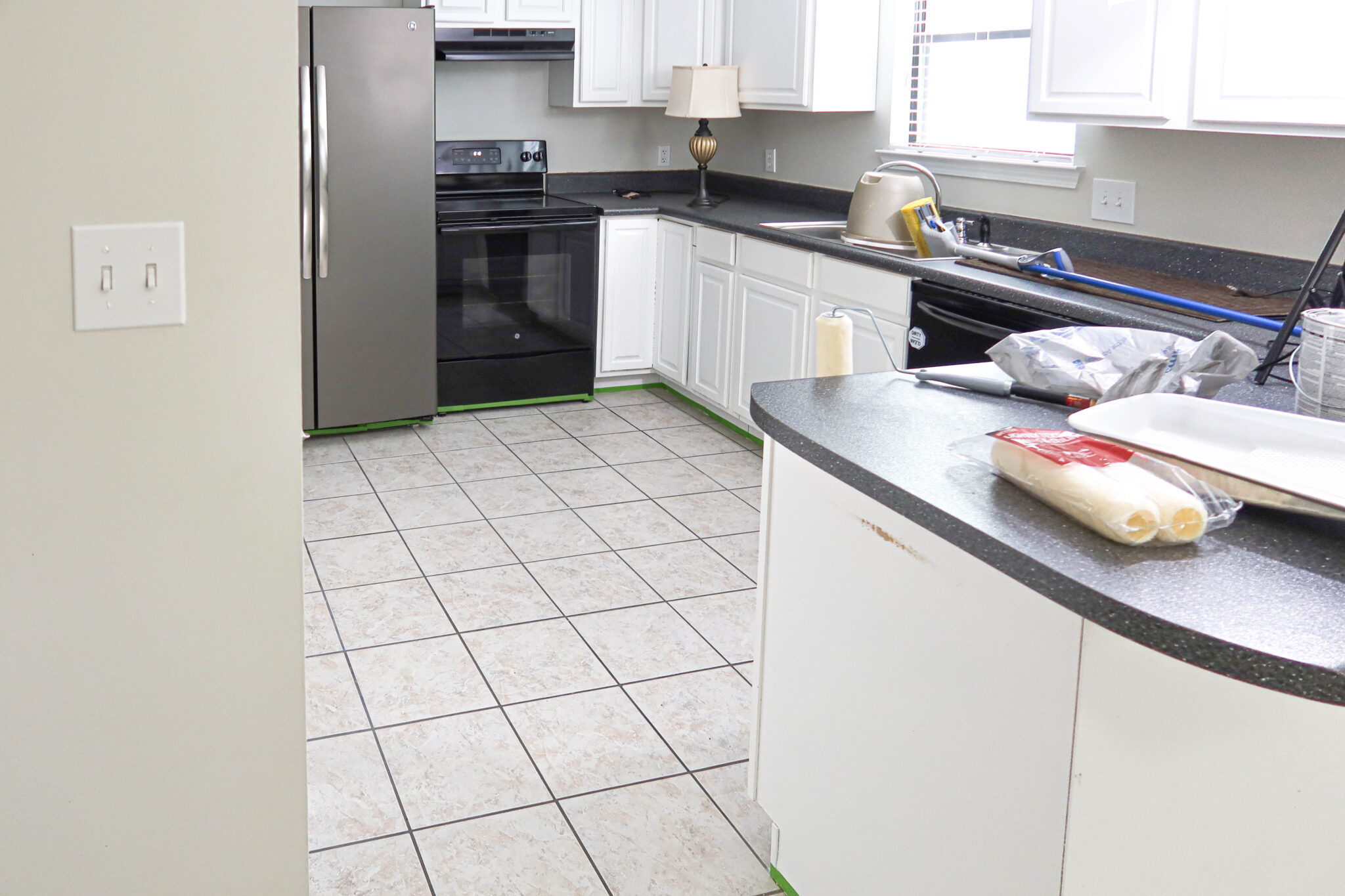 Using Rust-Oleum Home Floor Coating to Paint Outdated Tile Floor