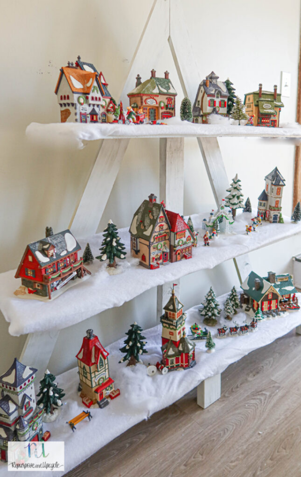 Christmas Village Display Idea with a Christmas tree shaped Shelf