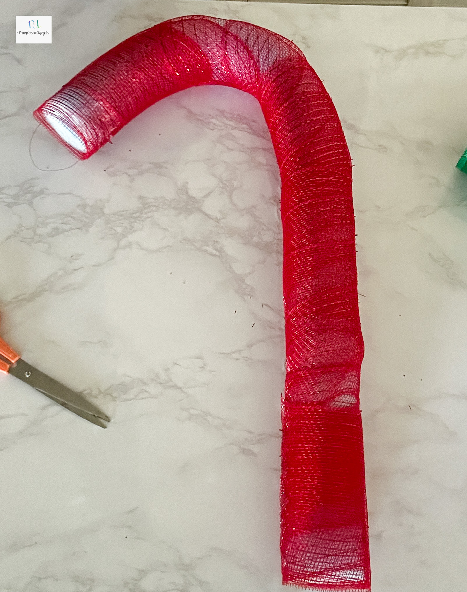 Candy Cane Mesh Wreath with a Pool Noodle and a Metal Hanger